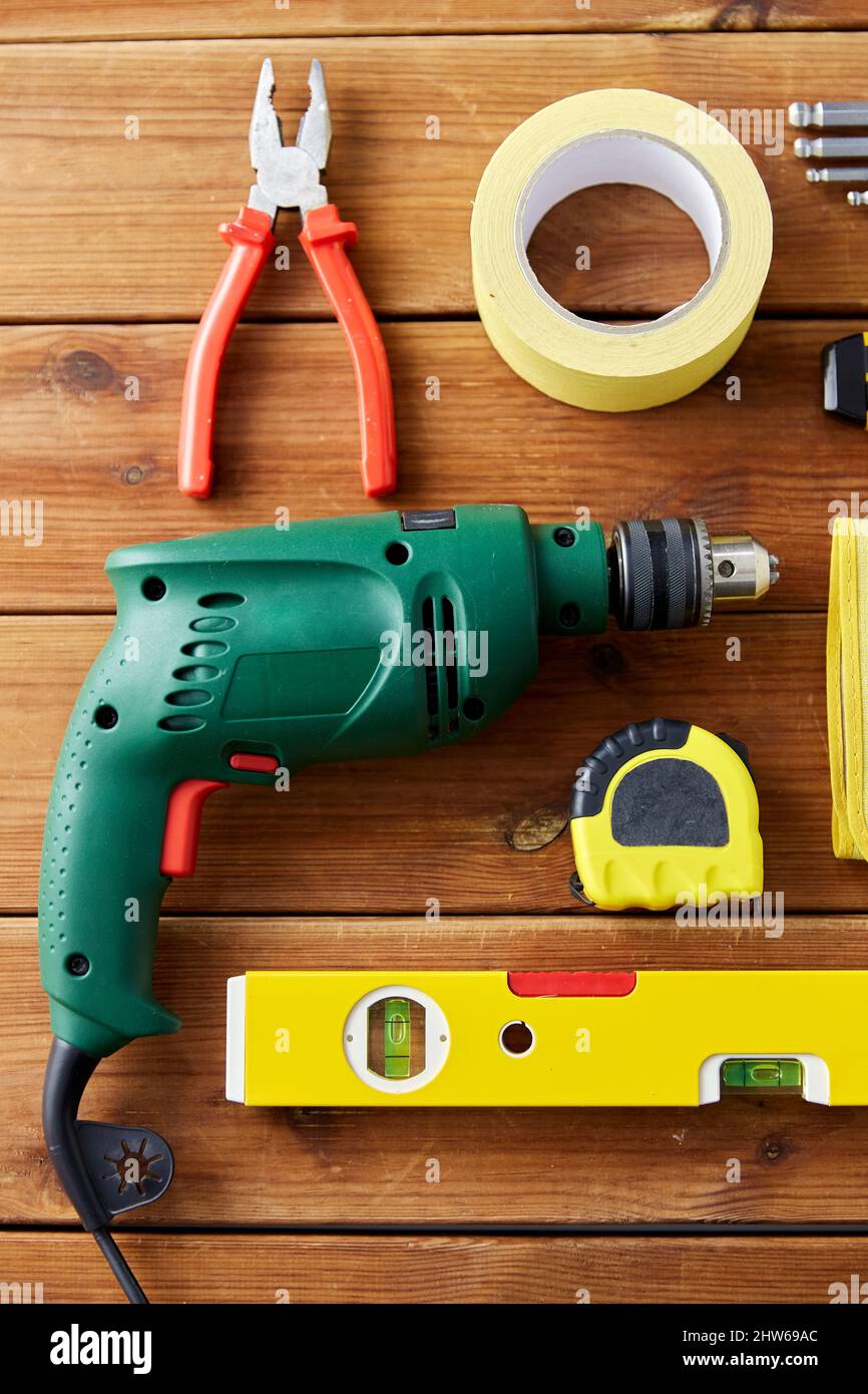 different work tools on wooden boards Stock Photo - Alamy
