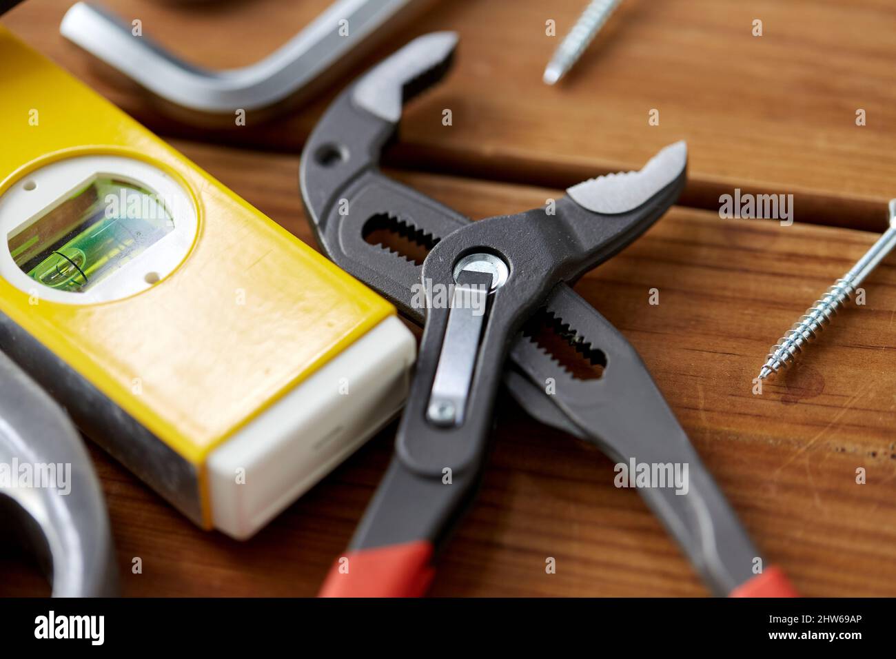 adjustable wrench and other different work tools Stock Photo - Alamy