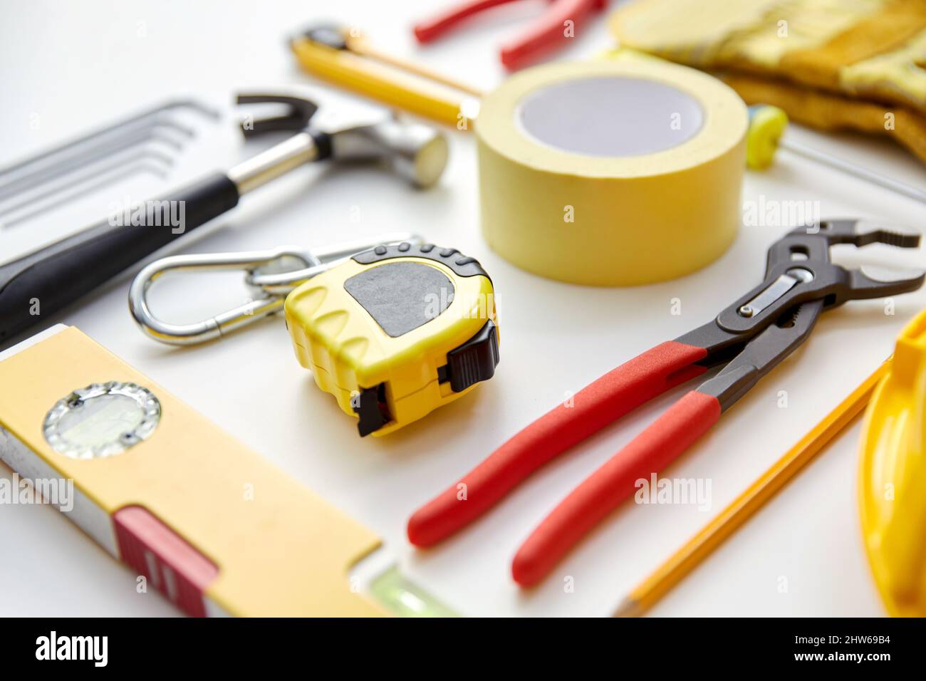 different work tools on white background Stock Photo - Alamy