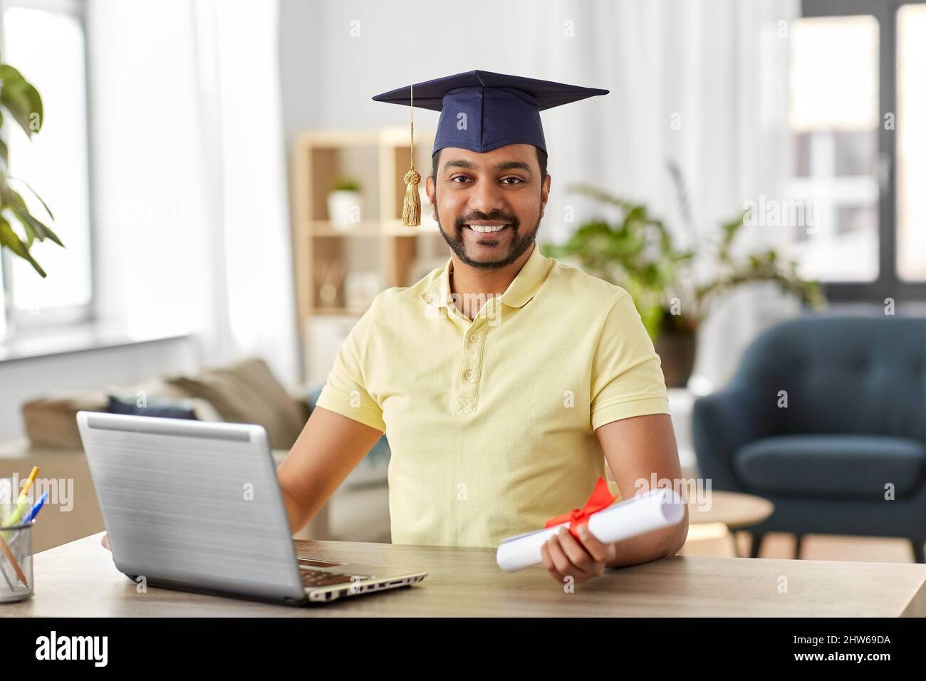 Indian student with laptop hi-res stock photography and images - Alamy