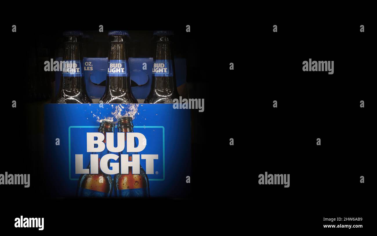 BUD LIGHT bottles on black background with copy space. BUD LIGHT is an ...