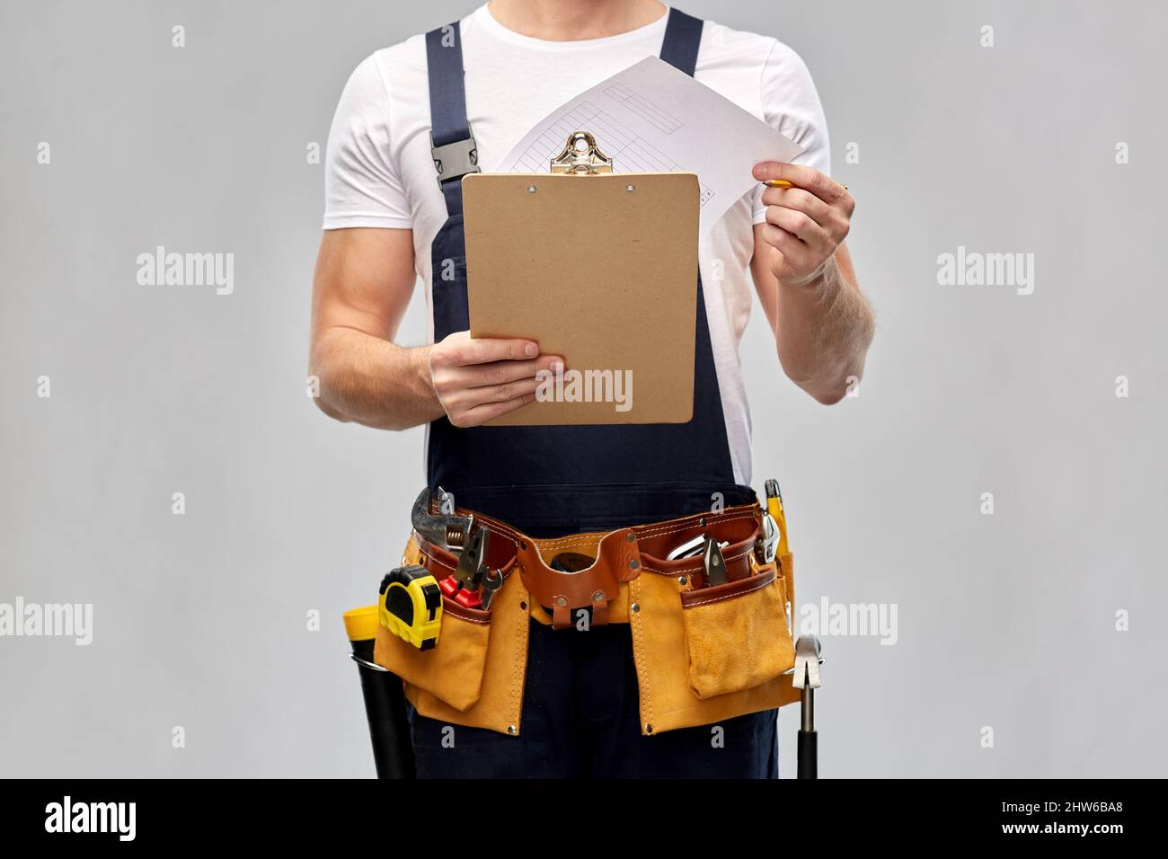 Professional repairman clipboard tools hi-res stock photography and ...
