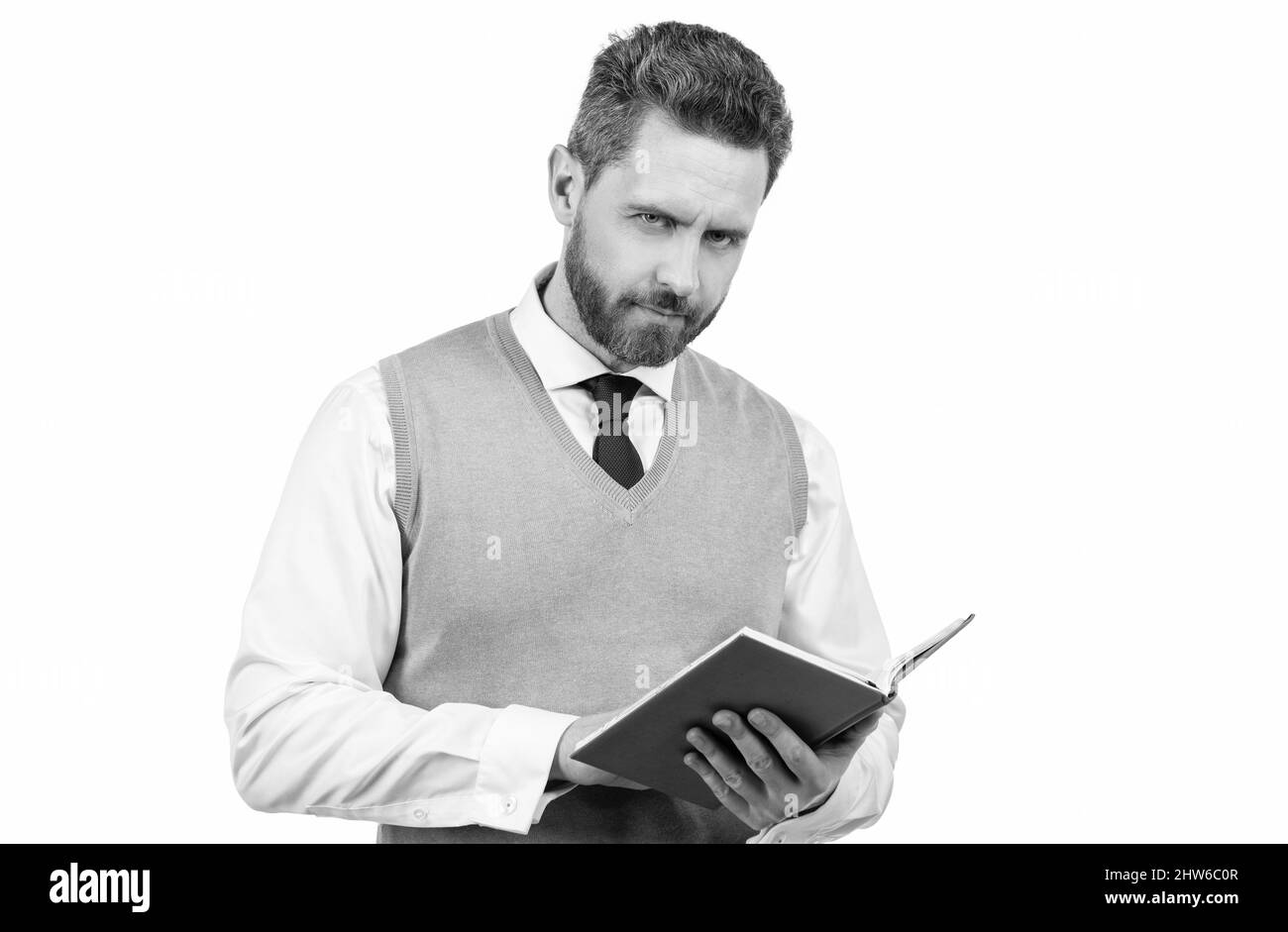 serious guy reading planner isolated on white background, planning ...