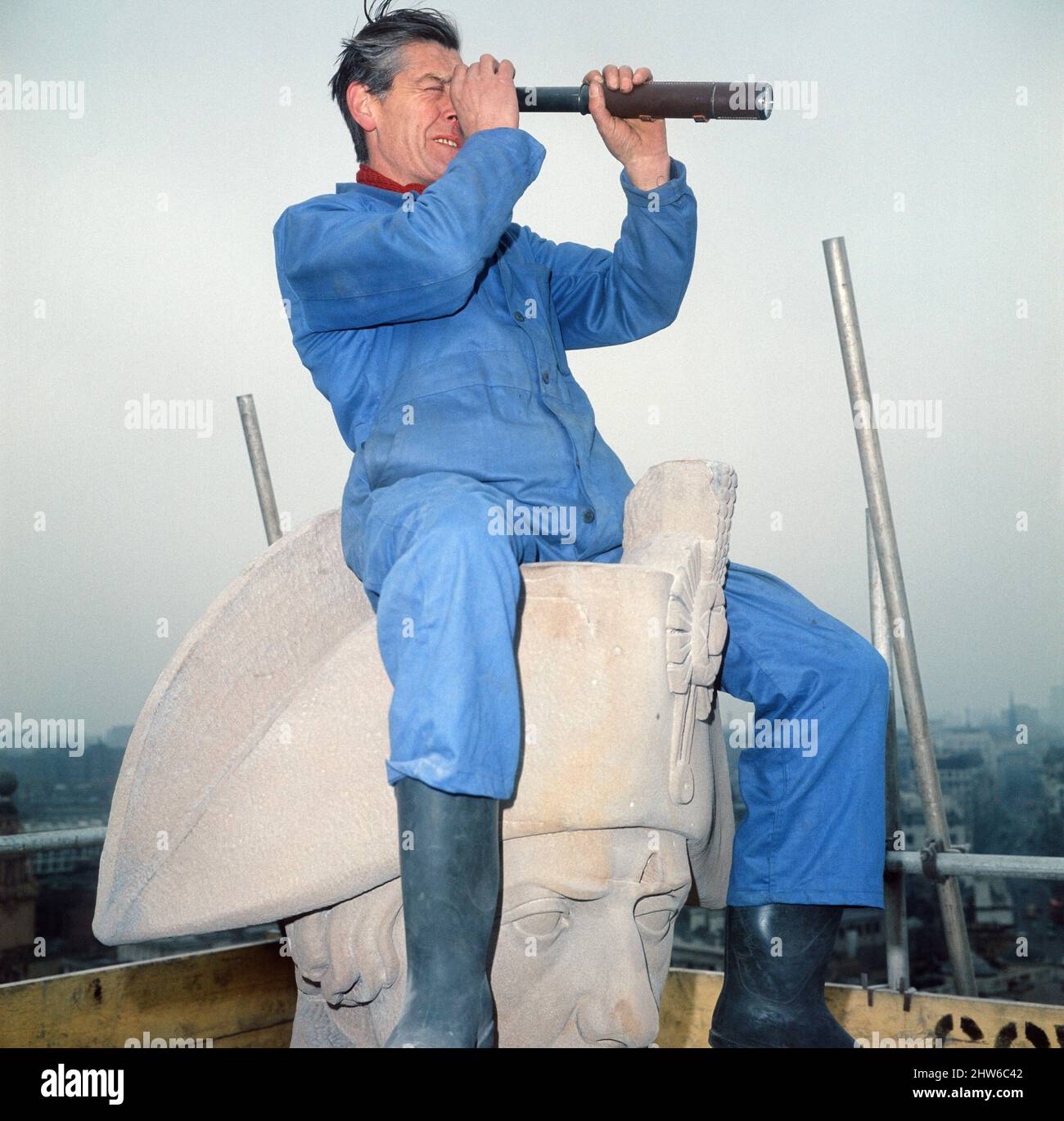 Nelson's Column being cleaned. Cleaner Ted Chambers on top of Nelson's ...