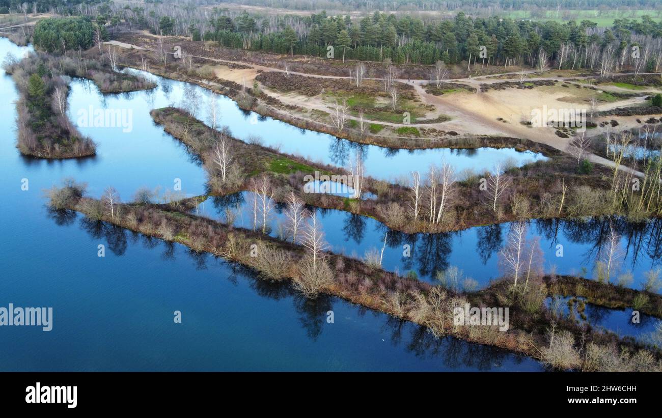 Aerial view of a shore of lake with various small islands Stock Photo ...