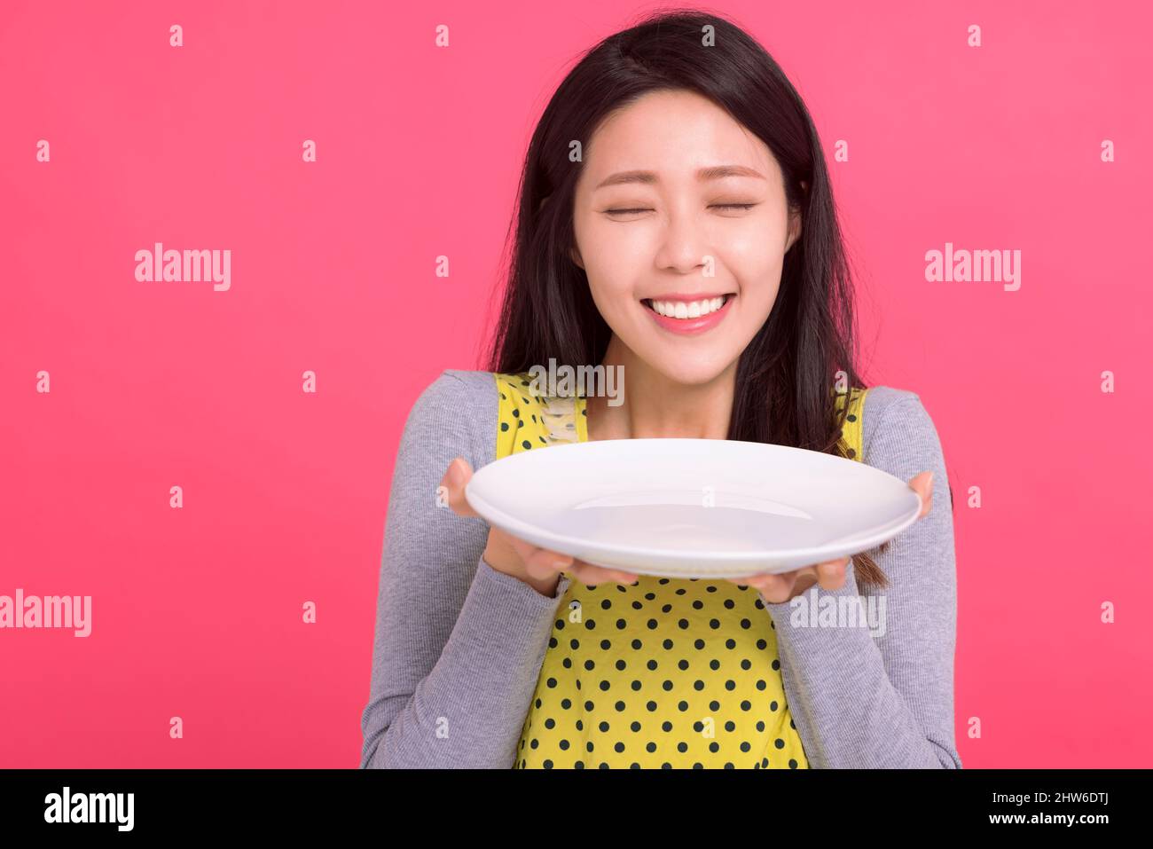 Hand holding plate white background hi-res stock photography and images ...