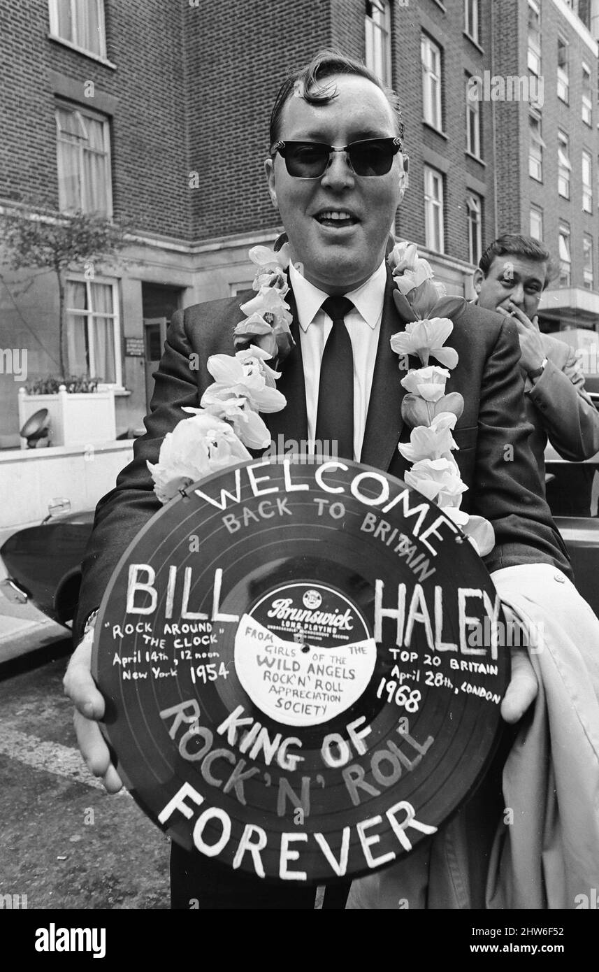American rock and roll singer Bill Haley holds a record with a Welcome ...