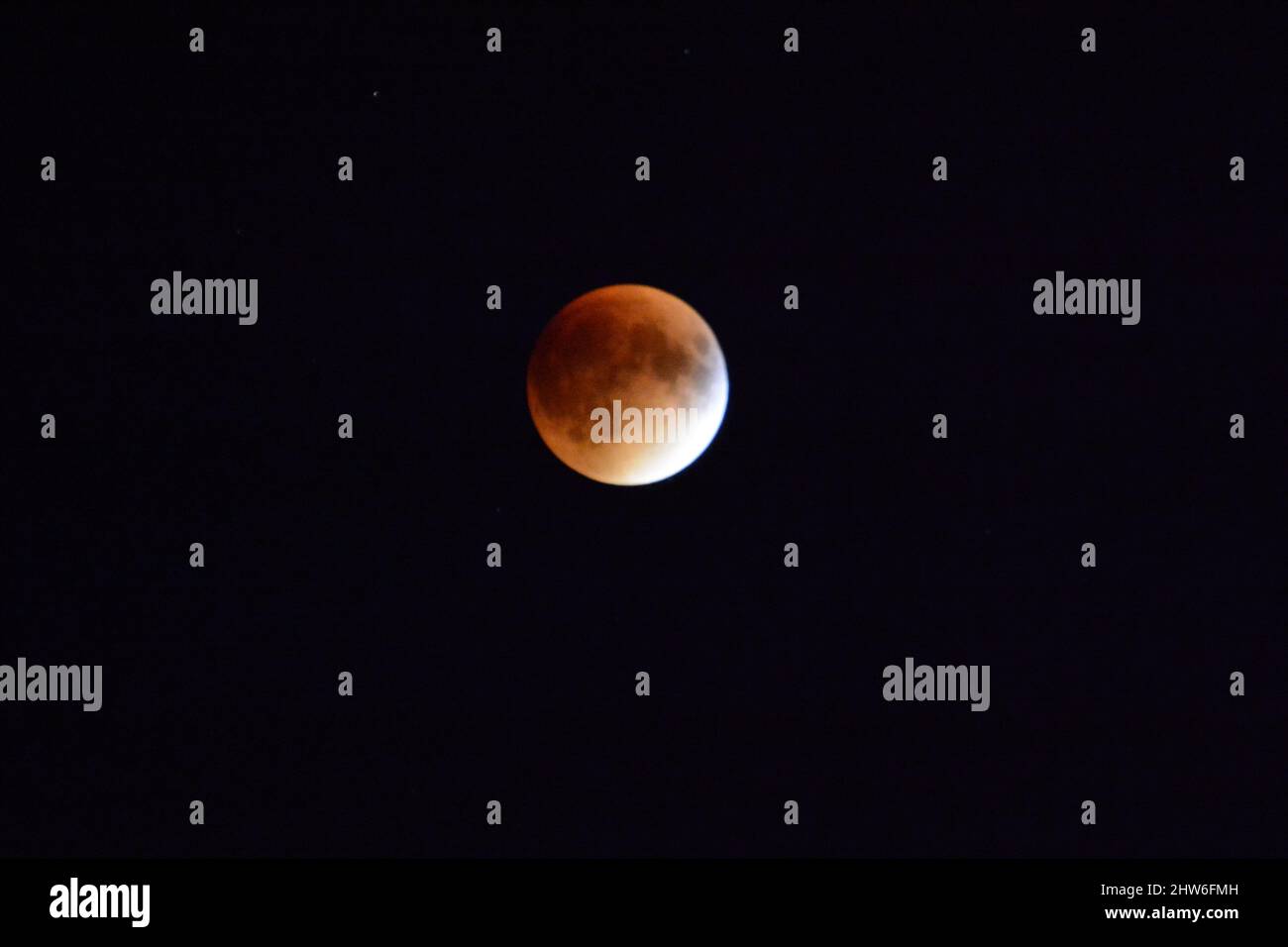 Super full blood moon with total lunar eclipse on dark sky Stock Photo ...