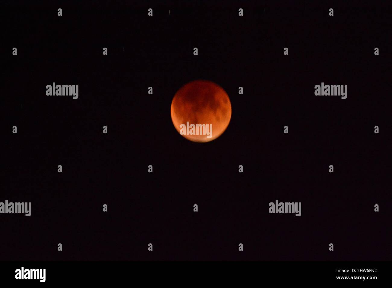 Beautiful blood moon with total lunar eclipse on dark sky Stock Photo ...