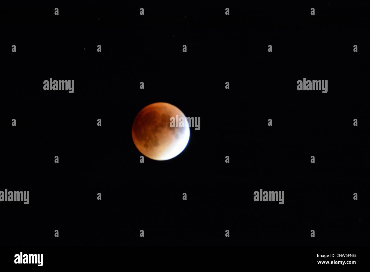 Beautiful red moon with total lunar eclipse on dark sky Stock Photo - Alamy