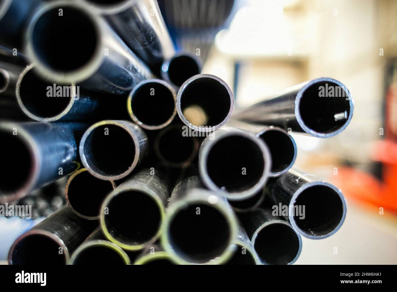 Metal tubes in factory with the details of commercial work Stock Photo ...