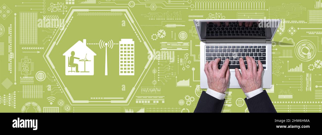 Top view of hands using laptop with symbol of teleworking concept Stock ...