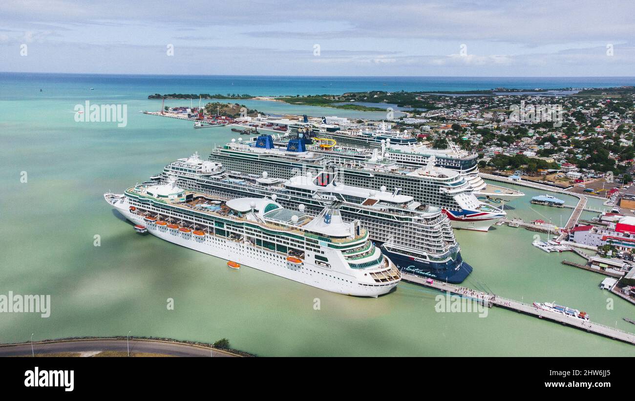Aerial drone shot of cruise ships docked at Heritage Quay in St. John's ...
