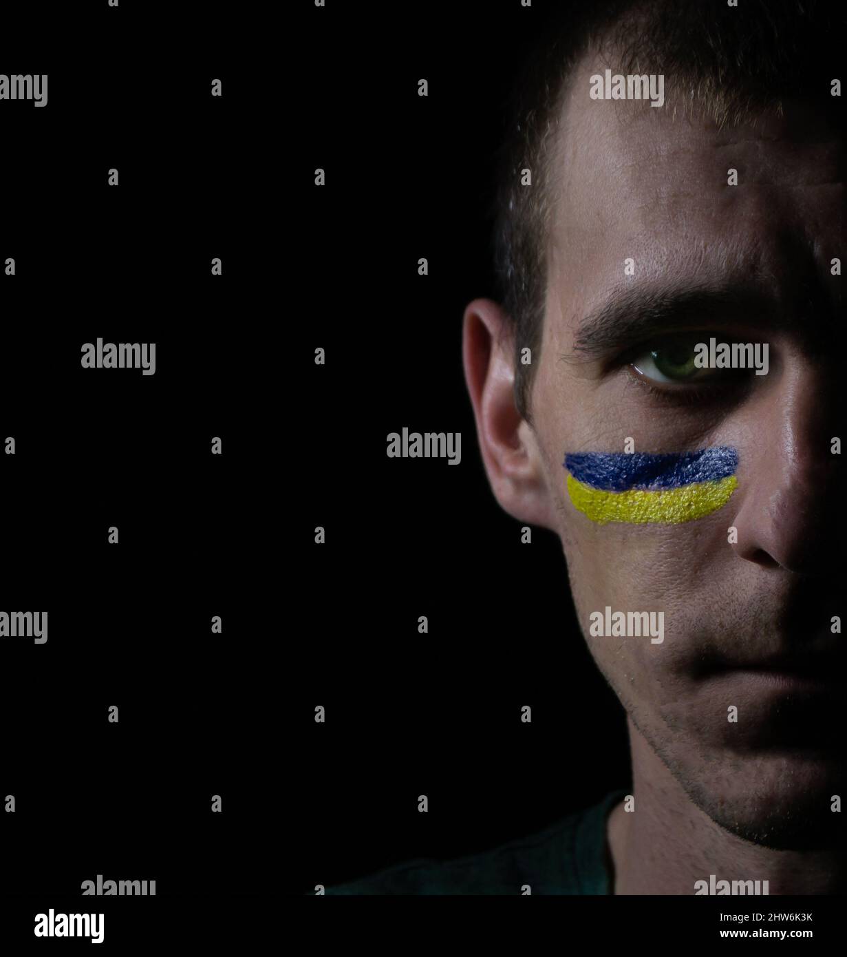 Close up of Portrait of angry patriotic Ukrainian man with painted ...