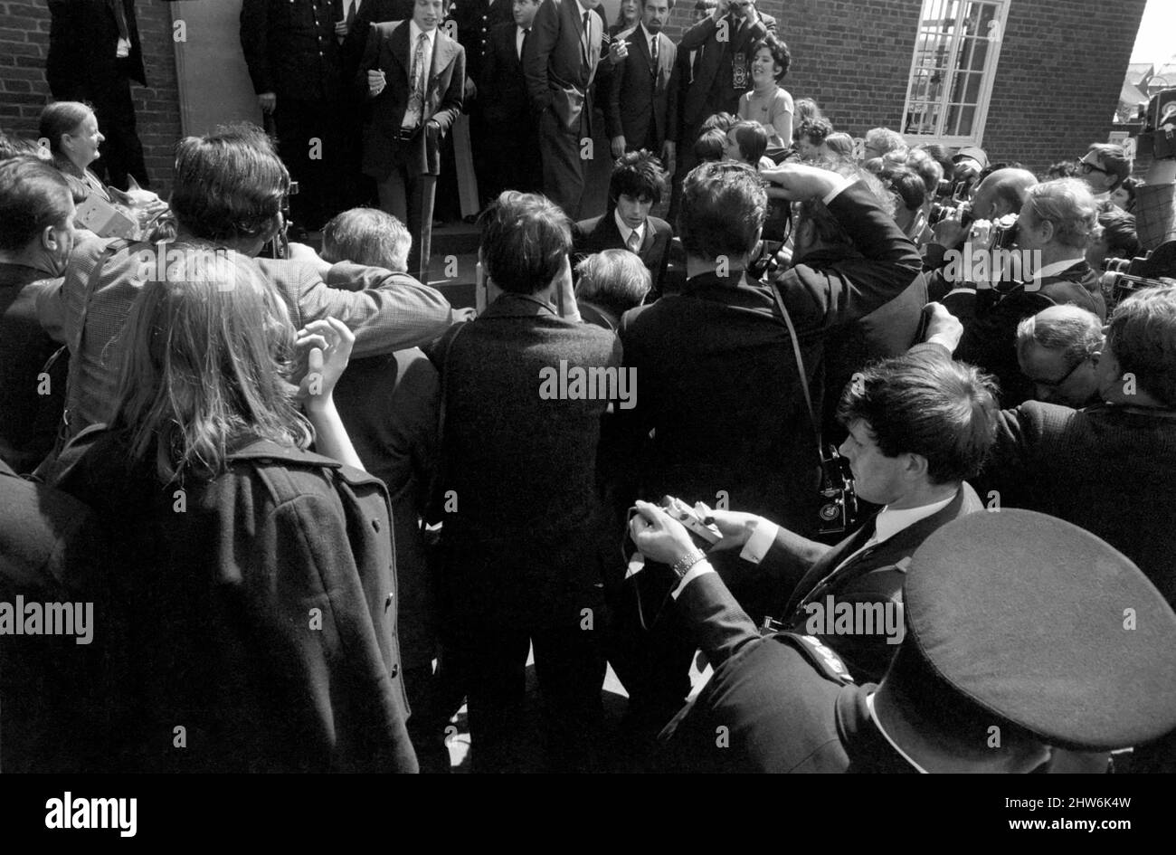 Crowds throng around Mick Jagger and Keith Richards on 10 May 1967 ...