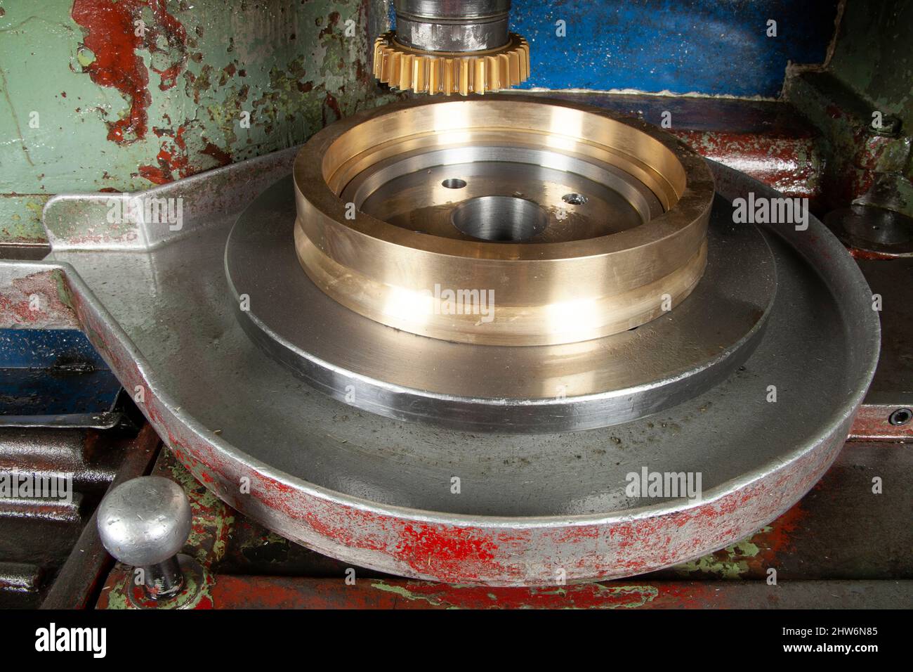 Metalworking on a lathe. Manufacturing industrial Stock Photo - Alamy