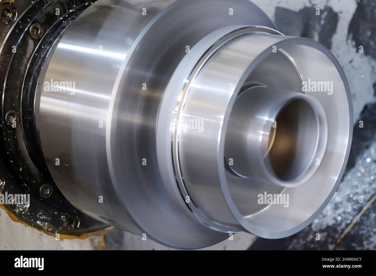 Metalworking on a lathe. Lathe, industry. Industrial background Stock ...