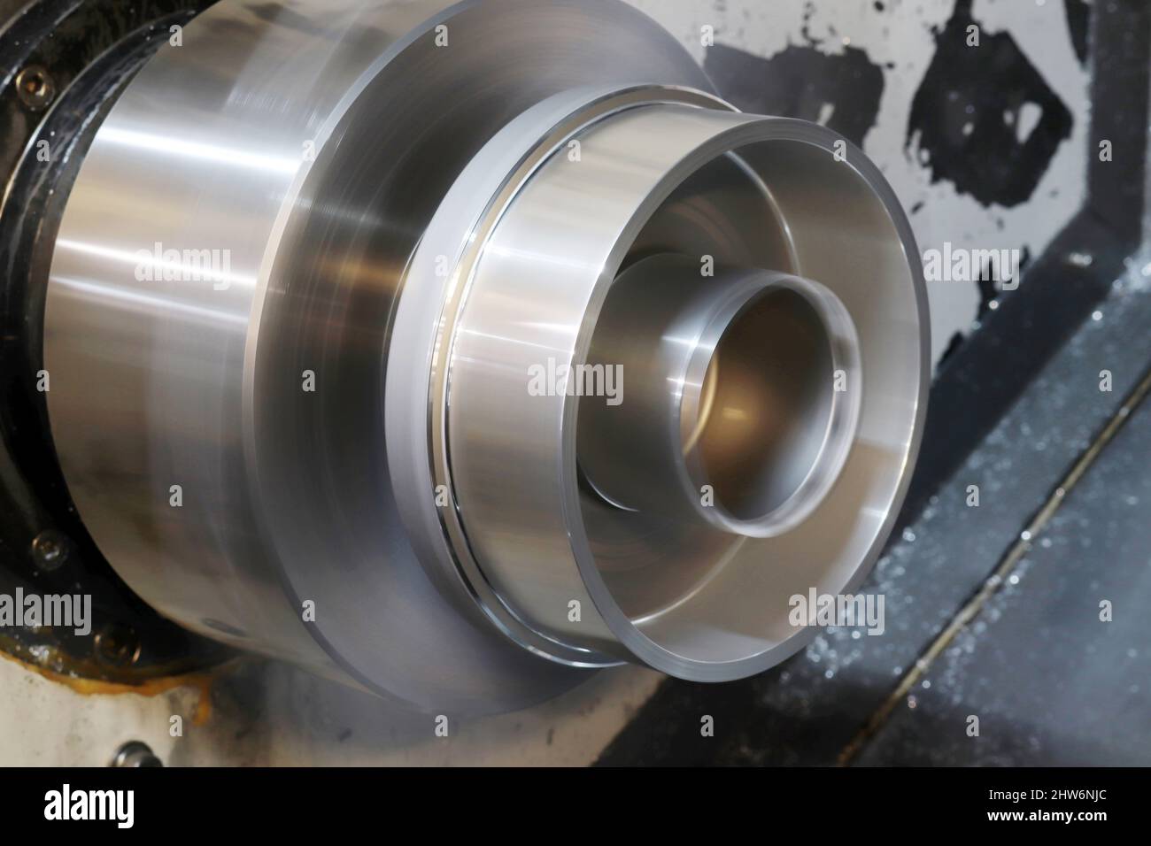 Metalworking on a lathe. Lathe, industry. Industrial background Stock ...