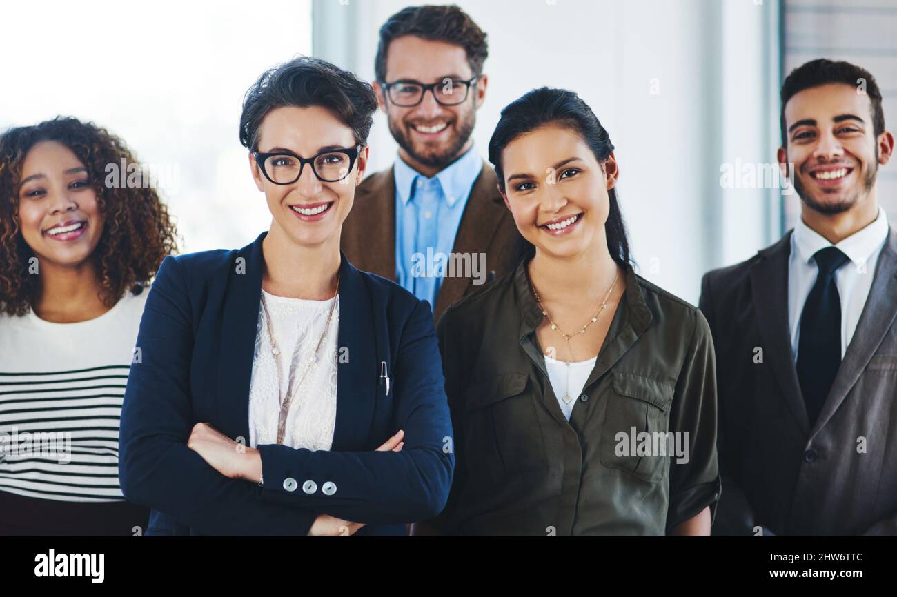 Watch us rise to the next level. Portrait of a diverse team of ...