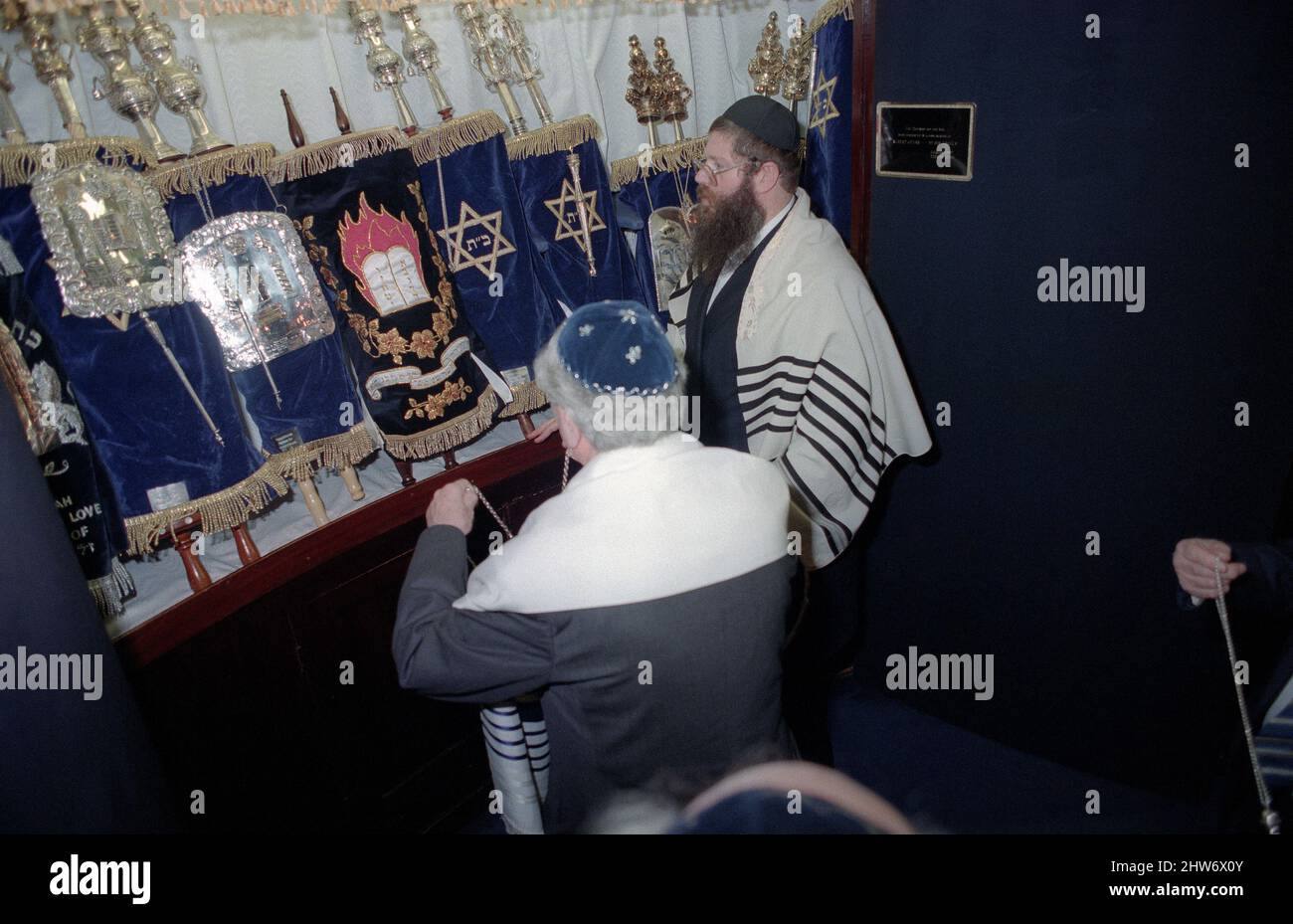 The new Sefer Torah is placed in the Aaron Hakodesh (Ark) ending the ...