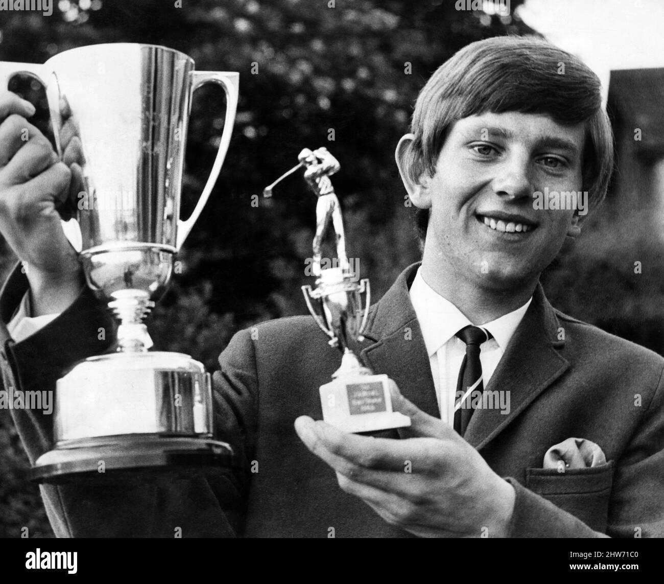 Proudly holds Black and White Stock Photos & Images - Alamy