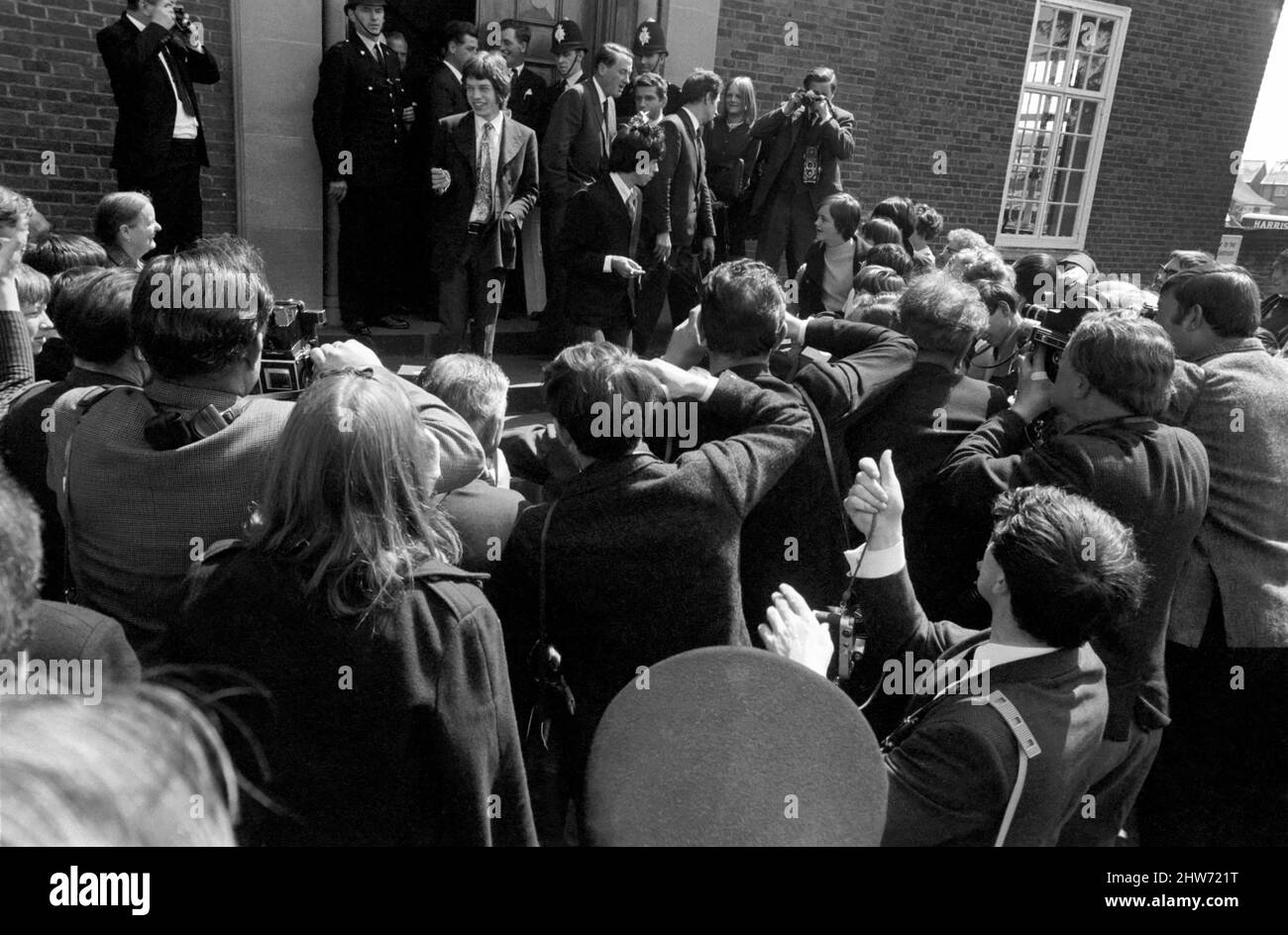 Crowds throng around Mick Jagger and Keith Richards on 10 May 1967 ...