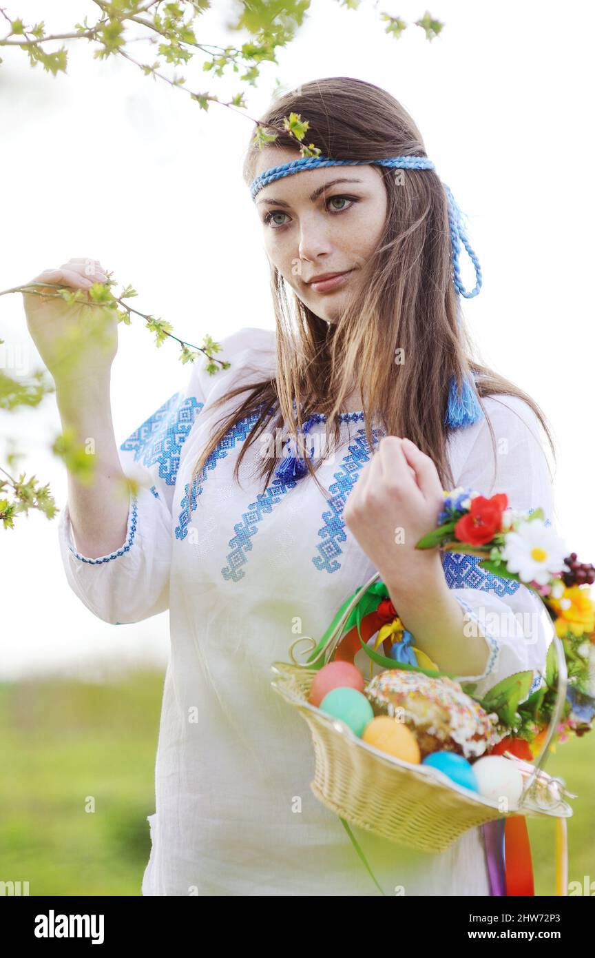 Slavic girl in Ukrainian shirt with Easter baskets in their hand Stock ...