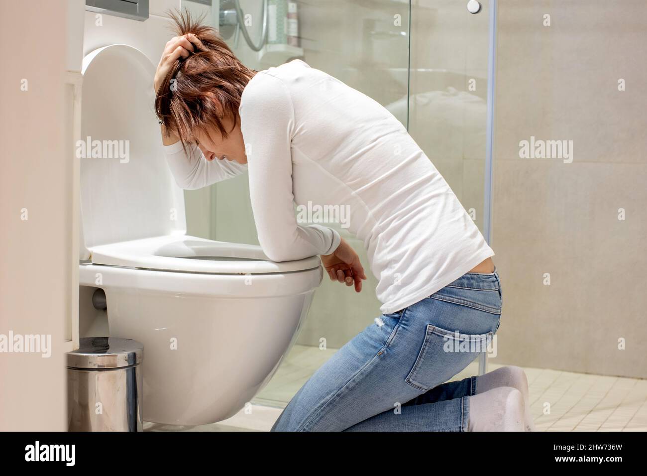 Woman, girl, experiencing sickness, vomiting, pregnancy, poisoning and ...