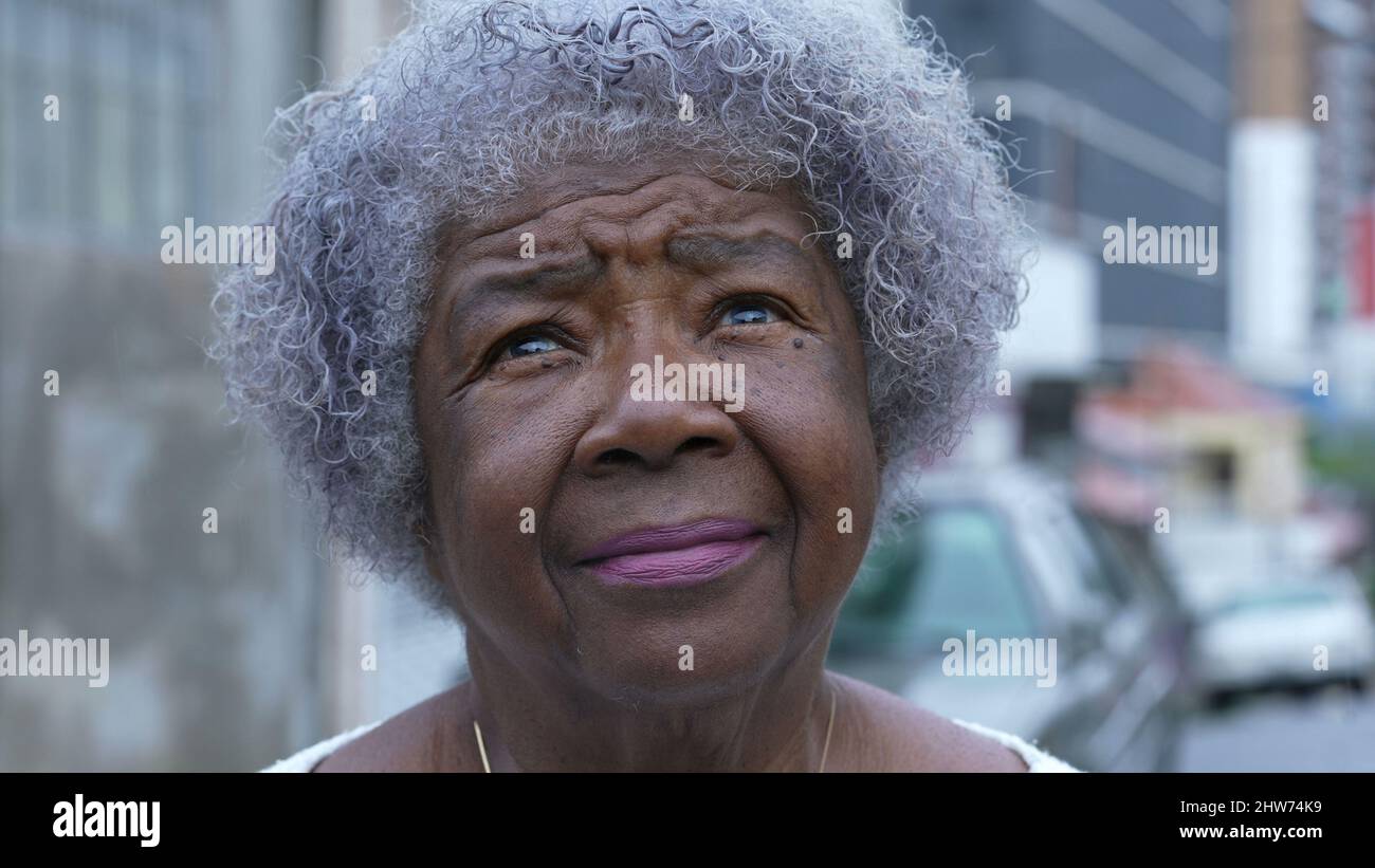 An older senior person looking up to sky with HOPE and FAITH Stock ...