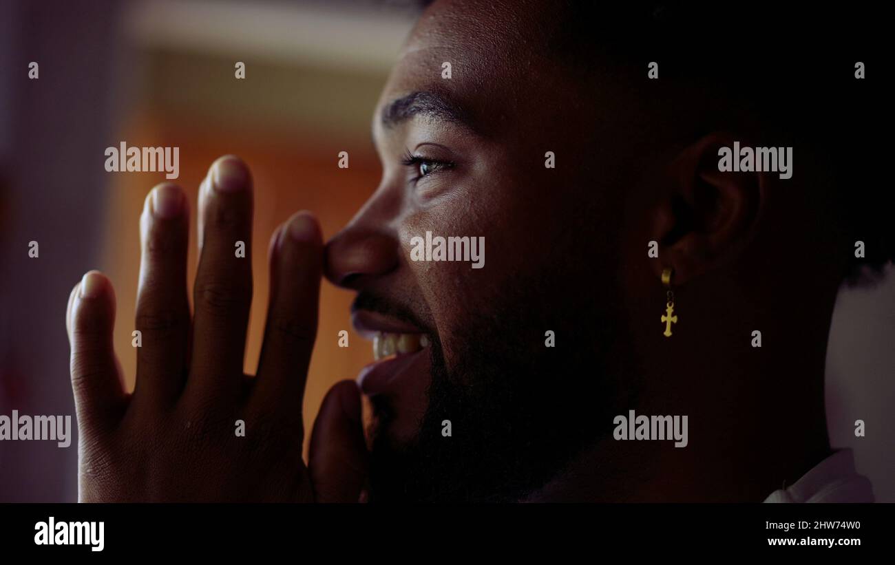 One happy man praying to God with HOPE and FAITH Stock Photo - Alamy