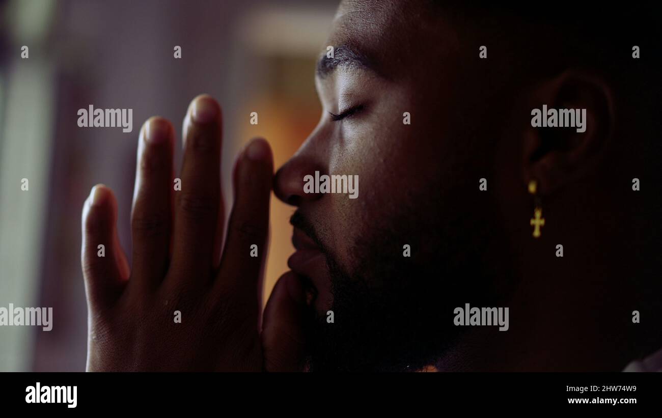 One happy man praying to God with HOPE and FAITH Stock Photo - Alamy
