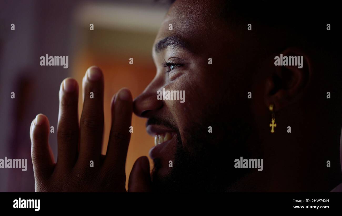 One happy man praying to God with HOPE and FAITH Stock Photo - Alamy