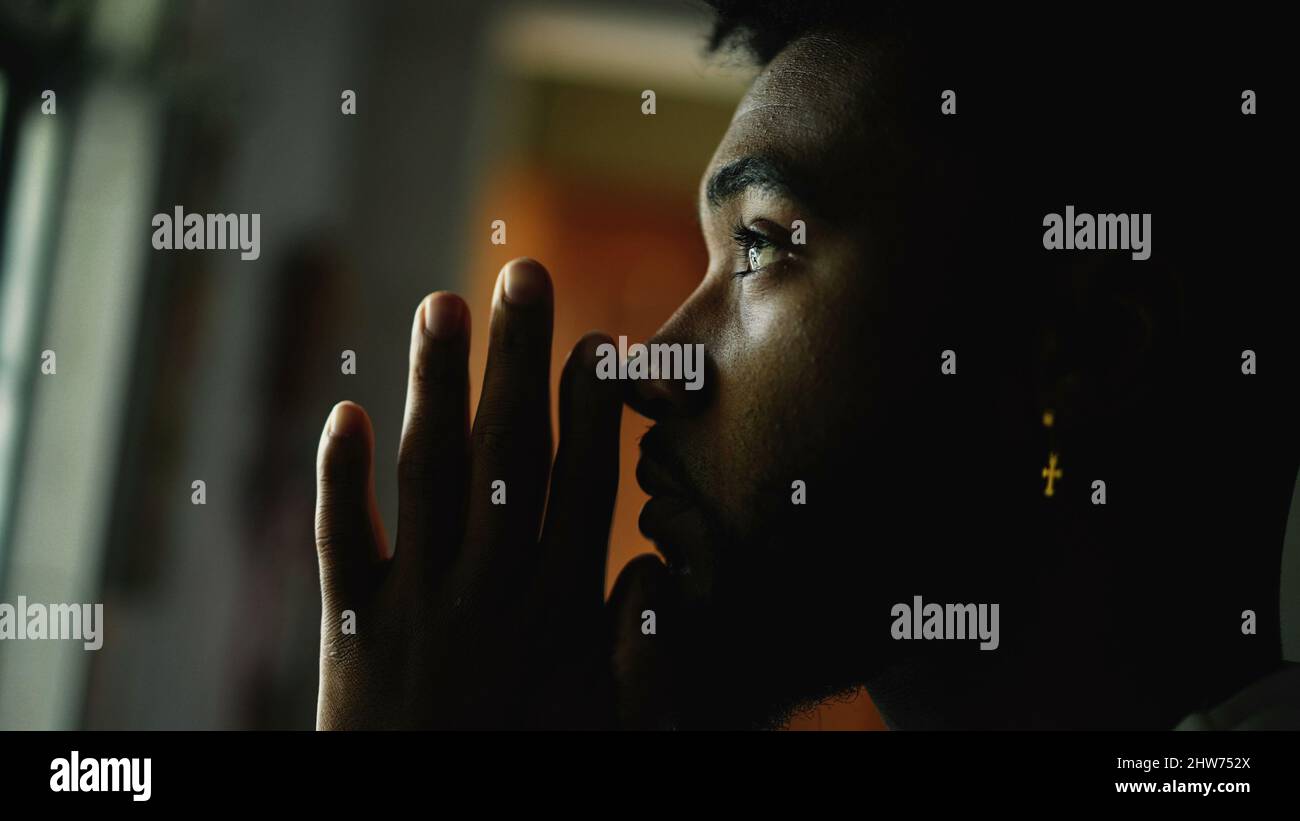 Spiritual young man praying to God having FAITH and HOPE Stock Photo ...