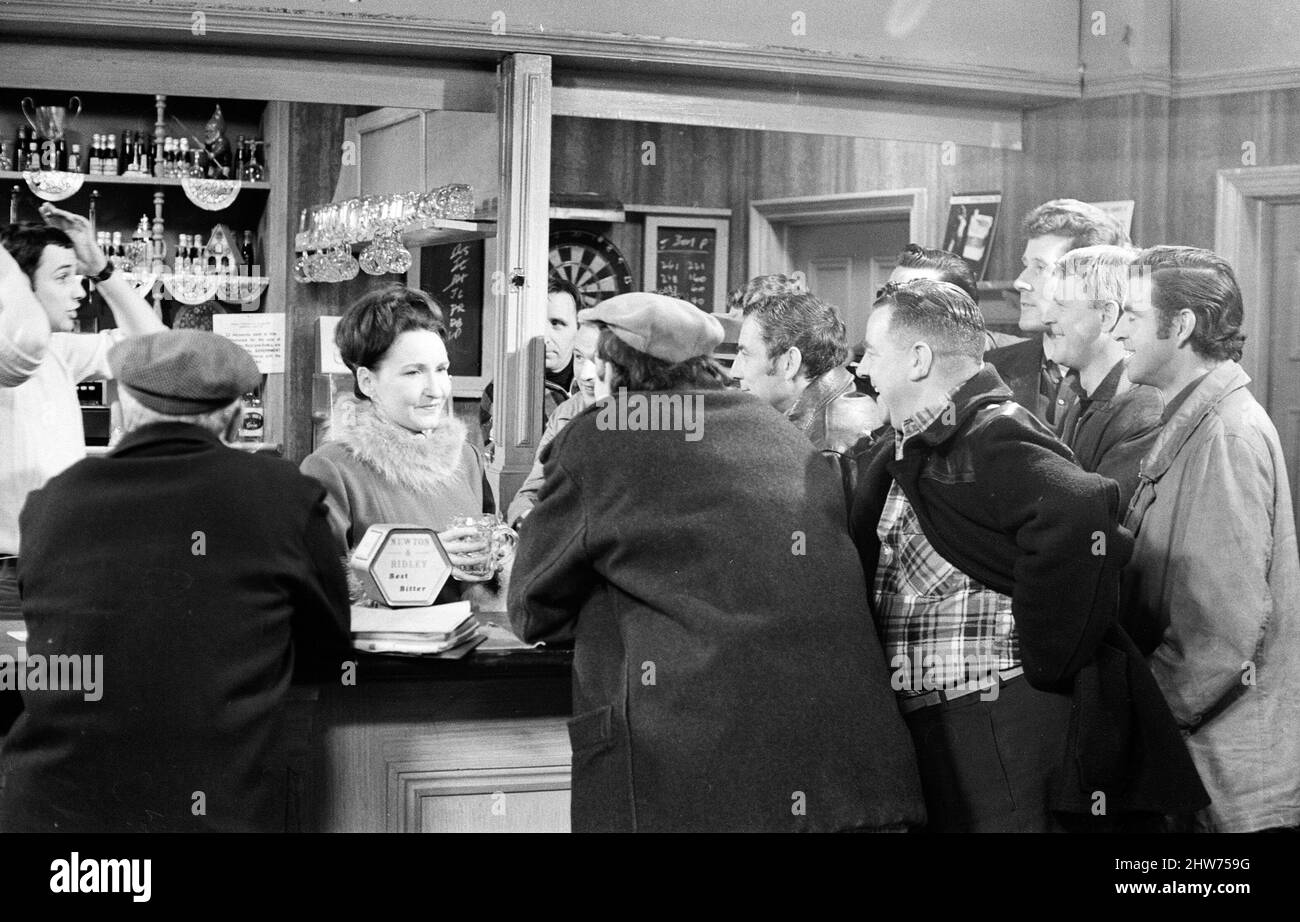 The cast of 'Coronation Street' on set. Eileen Derbyshire behind the ...
