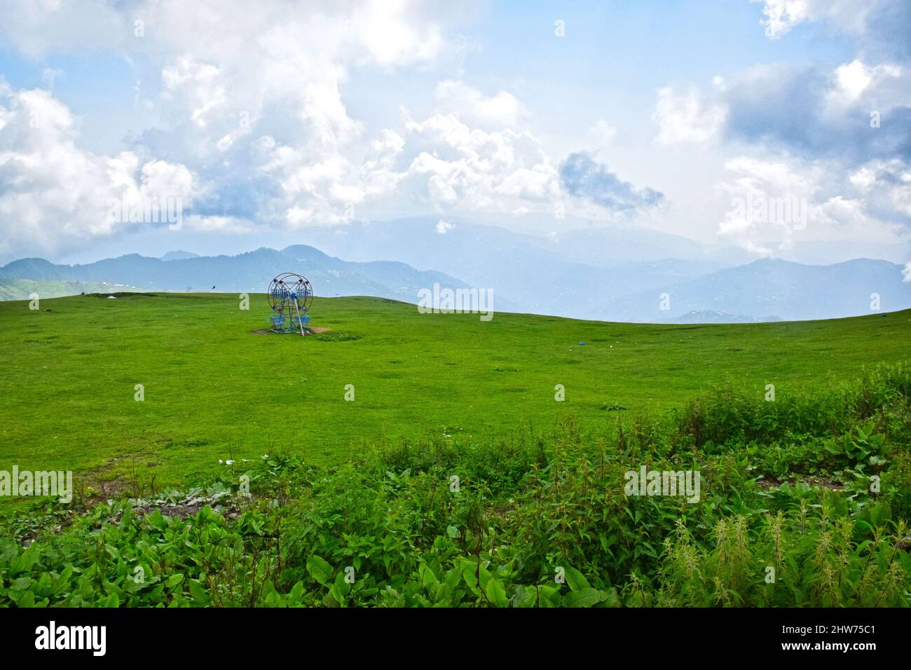 Scenic view of the green Tolipeer Meadows on the background of ...