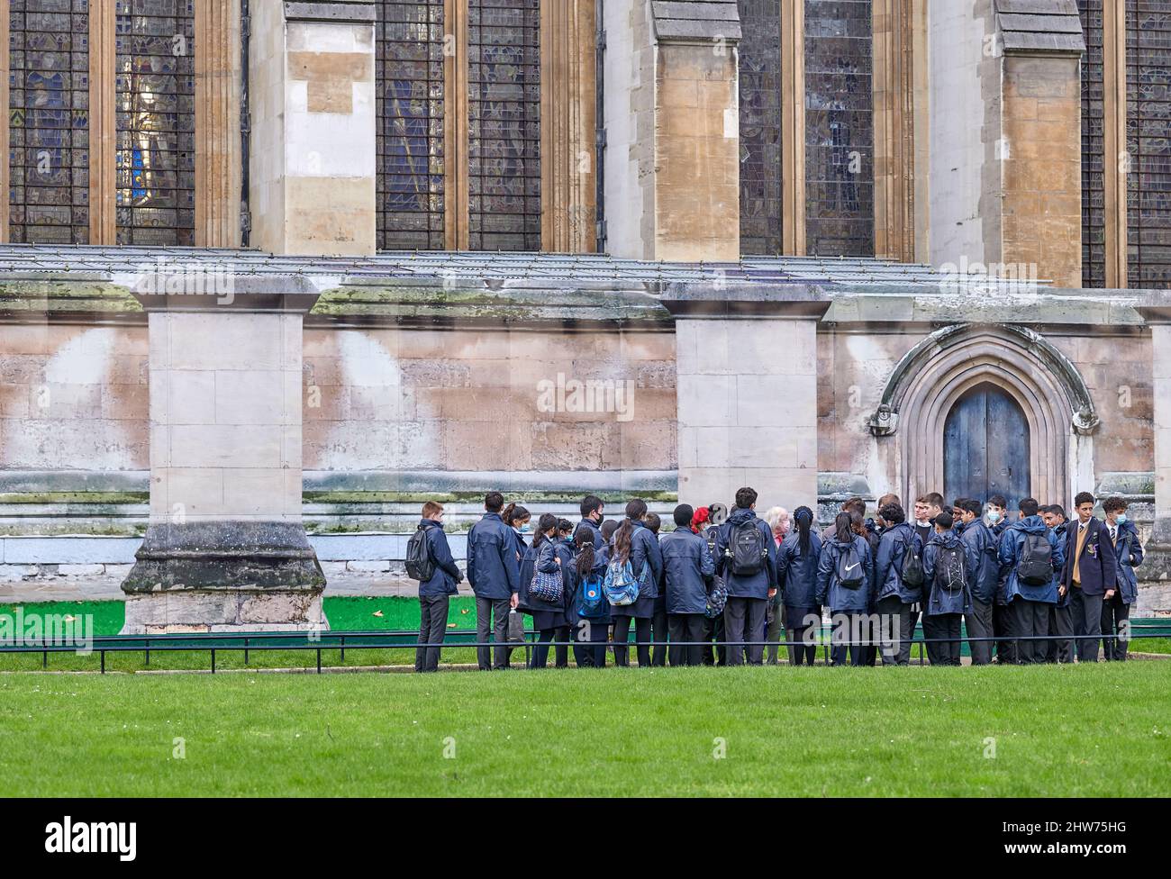 A party of teenagers with guide at Westminster Abbey, the royal ...