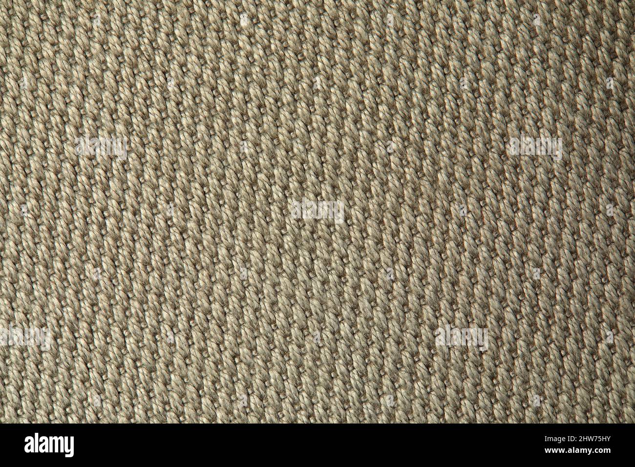 Knitted texture. Texture of jacquard fabric with gray beige geometric ...