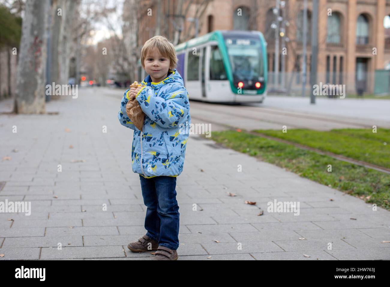 Cute little children tourists admiring Barcelona city, family travel ...