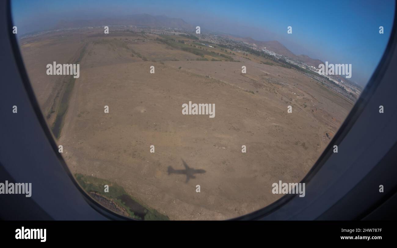 Aerial view of Santiago and the Andes mountains covered in smog and air ...