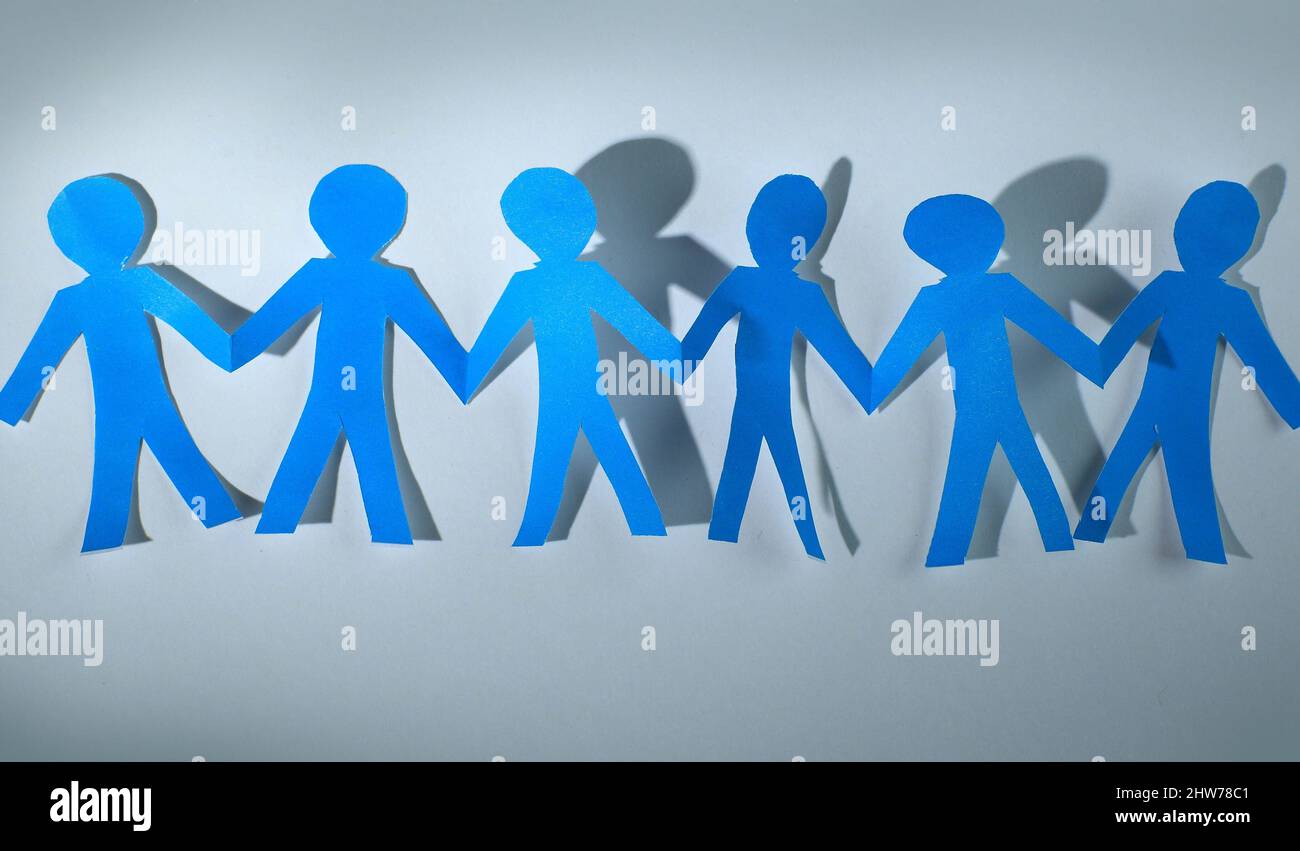 teamwork, paper people over white background Stock Photo - Alamy