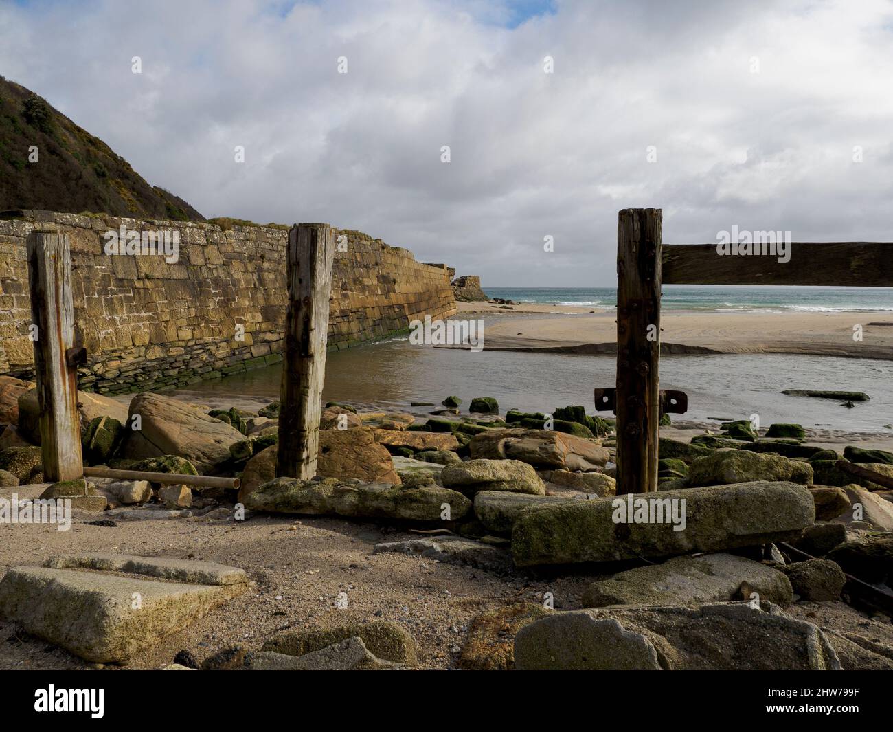 The remains of the pier wall part of the entrance to the harbour ...