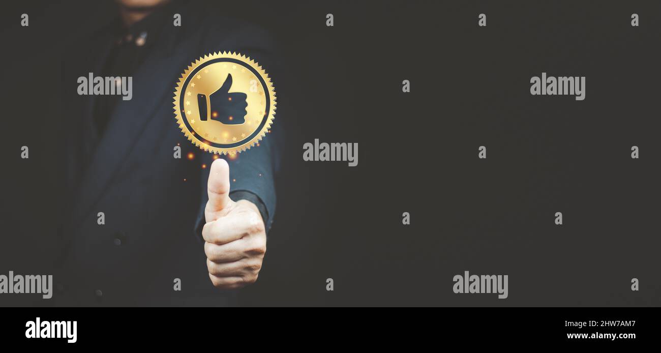 Quality product symbol in the hand of a business man.Hand shows the ...