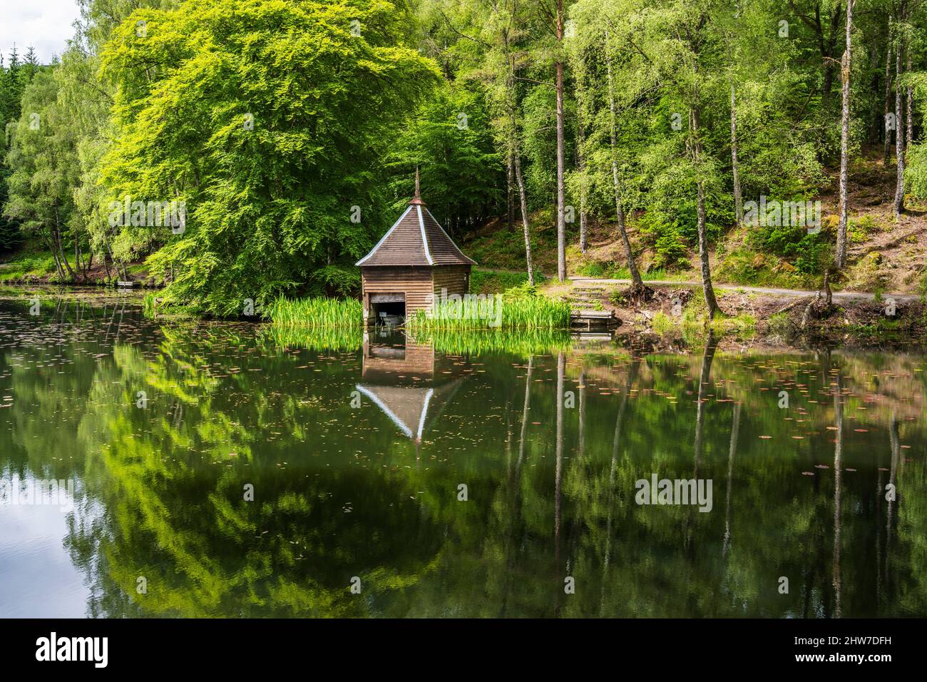 Loch Dunmore boathouse in Faskally Forest near Pitlochry in Perthshire ...