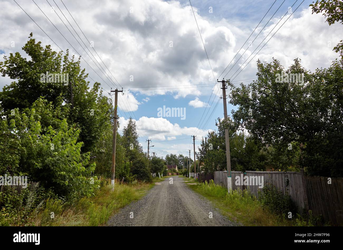 A gravel road at rural Europe. Suburban road path Stock Photo - Alamy