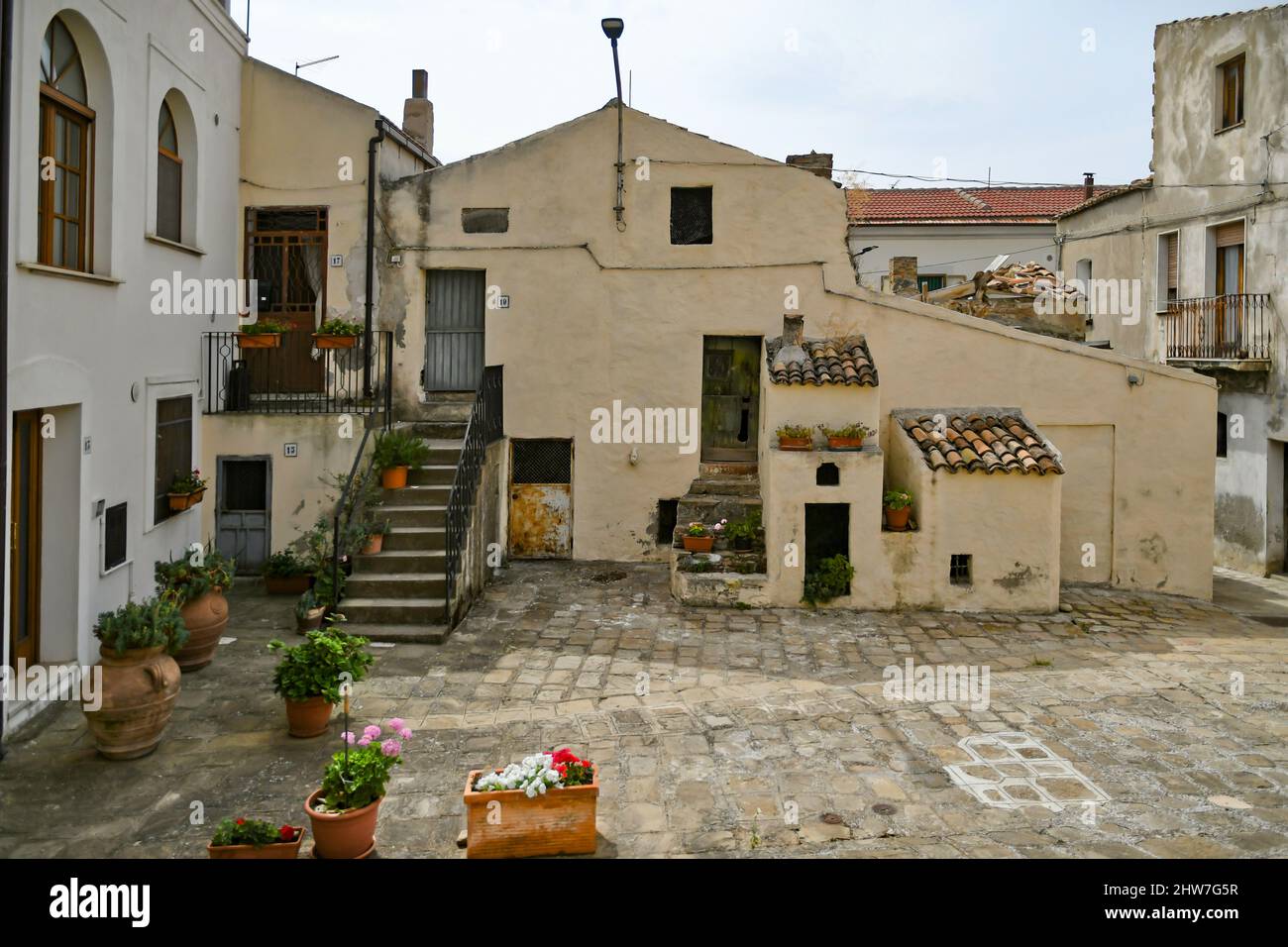 Small square between the old village houses in Aliano, Basilicata ...