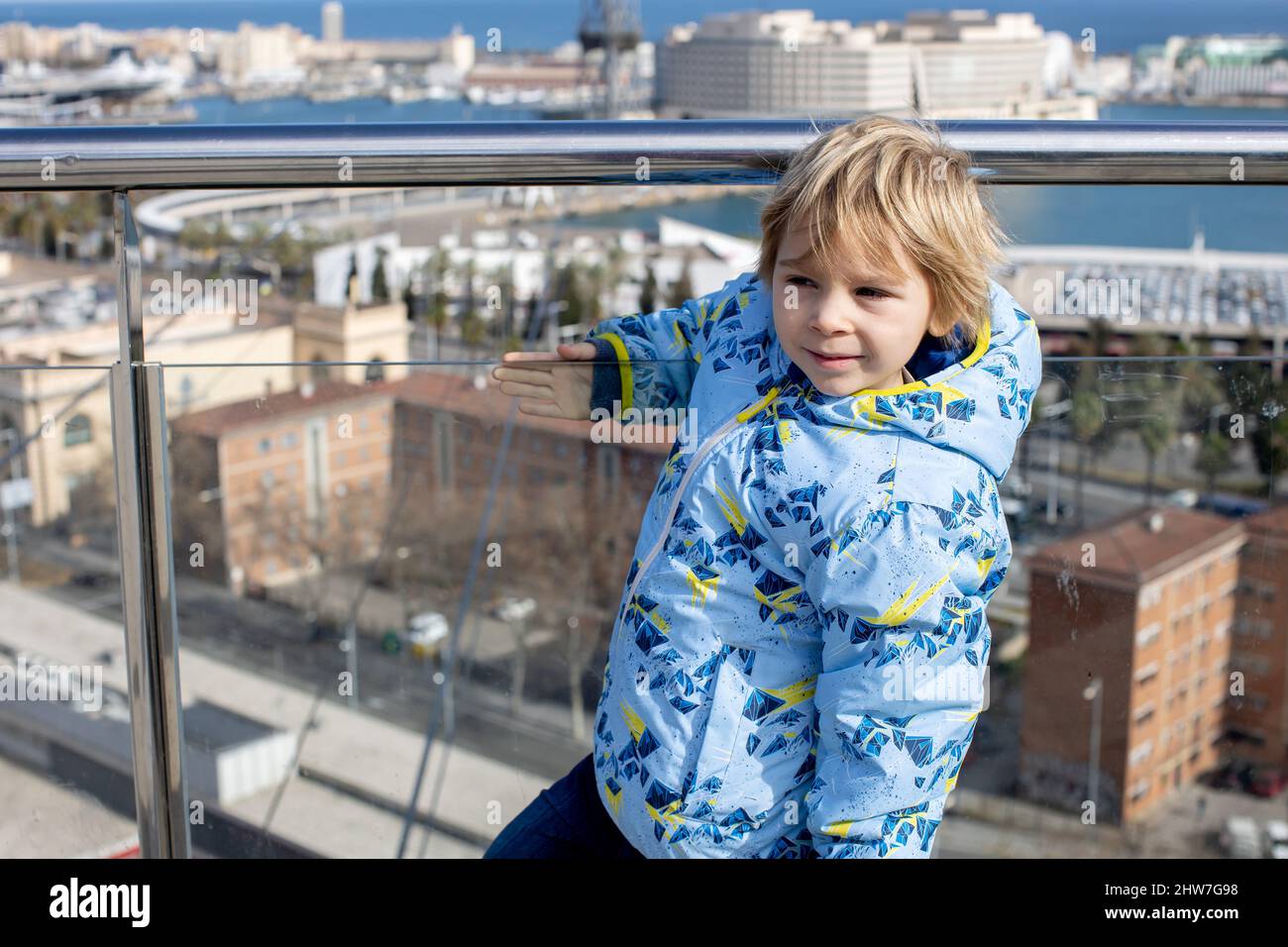 Cute little children tourists admiring Barcelona city, family travel ...
