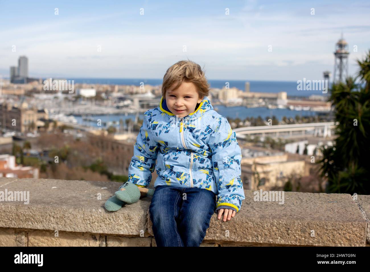 Cute little children tourists admiring Barcelona city, family travel ...