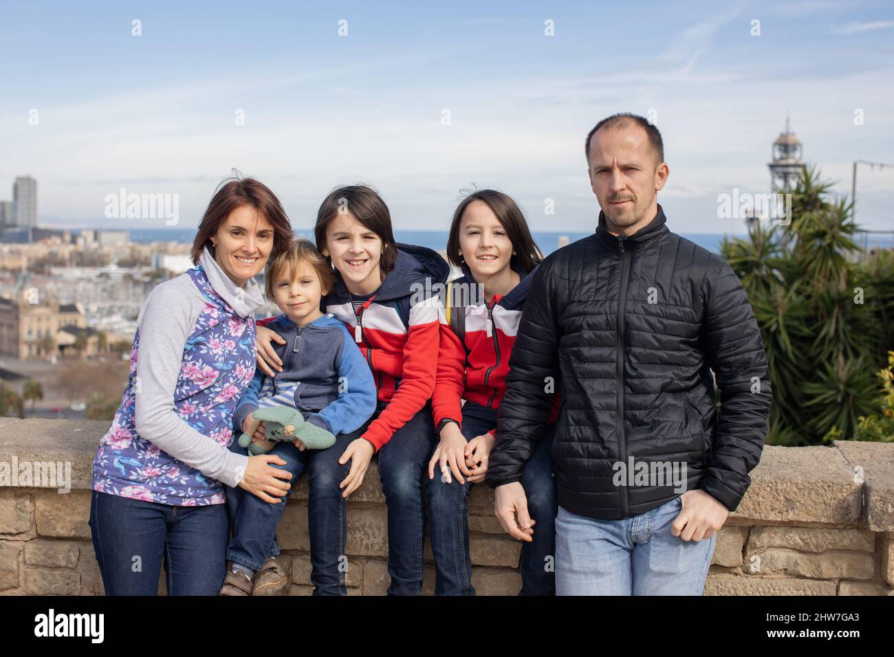 Cute little children tourists admiring Barcelona city, family travel ...