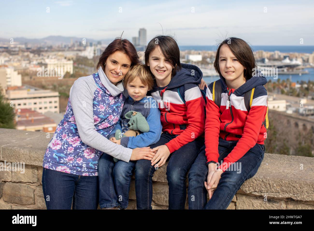 Cute little children tourists admiring Barcelona city, family travel ...