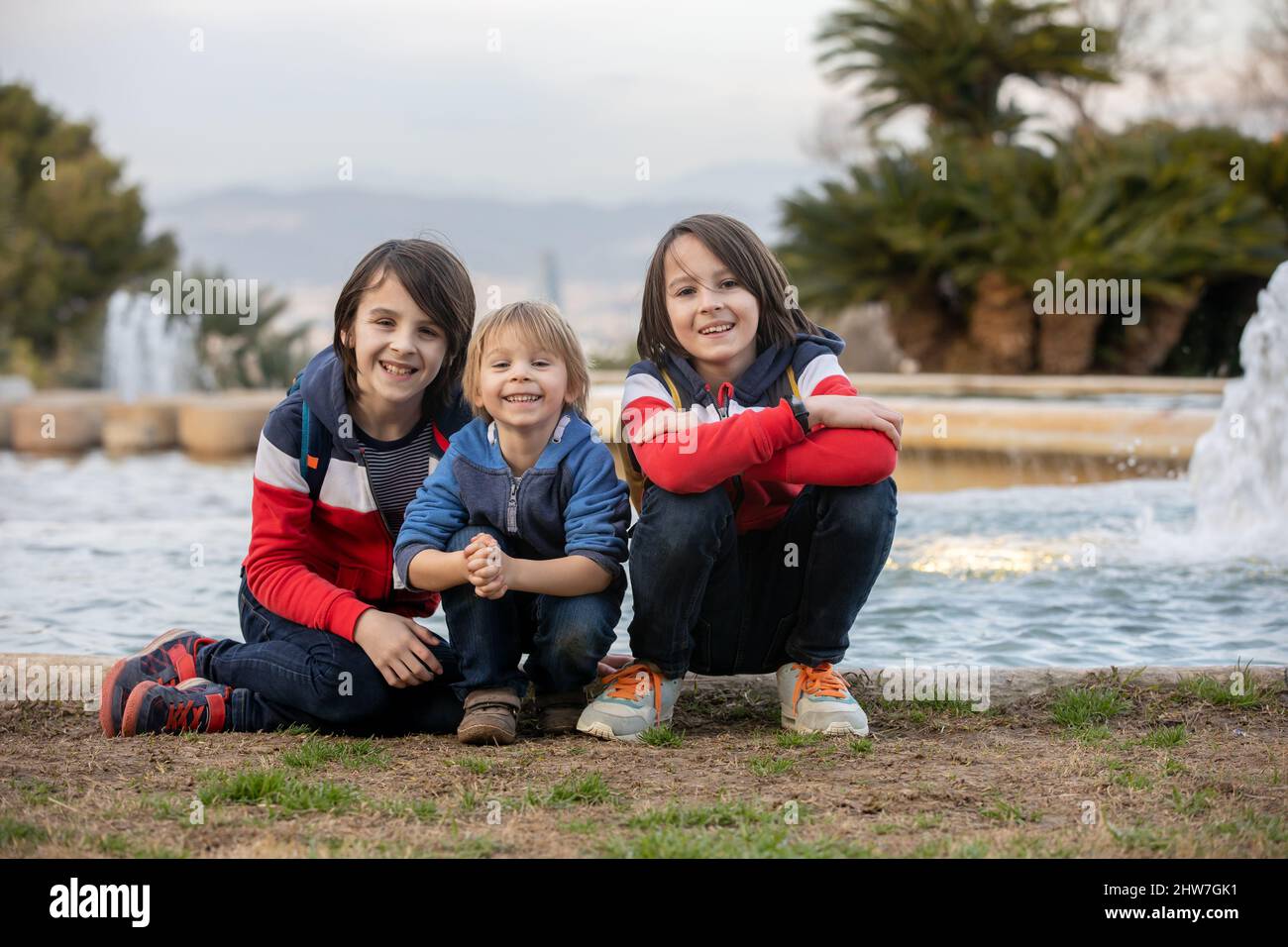 Cute little children tourists admiring Barcelona city, family travel ...